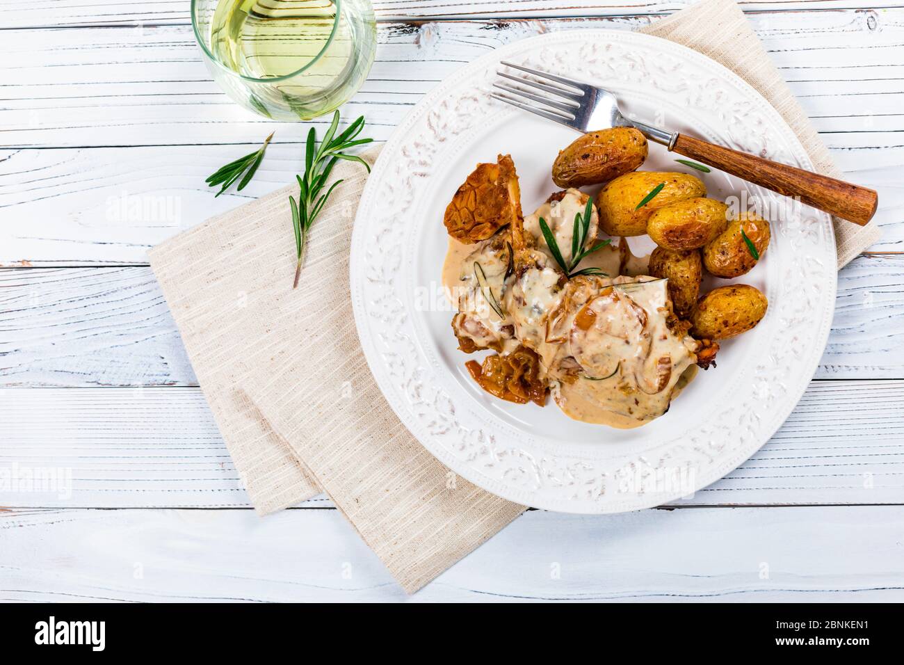 Fried Rabbit Meat With Rosemary in Sour Cream Sauce and Potato Stock ...