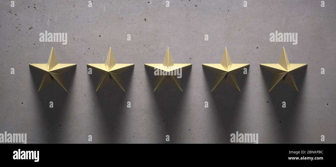 5 stars gold color sign. Shiny brass five stars on concrete stone ...