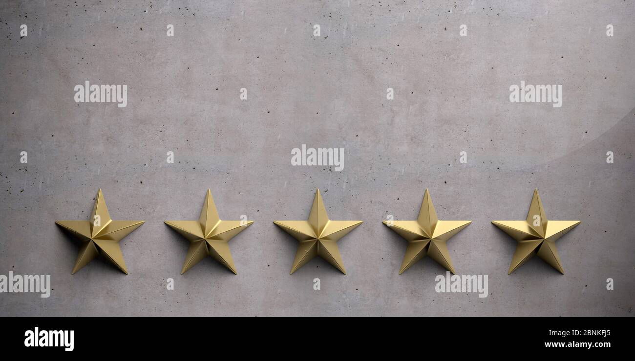 5 stars gold color sign. Shiny brass five stars on concrete stone ...