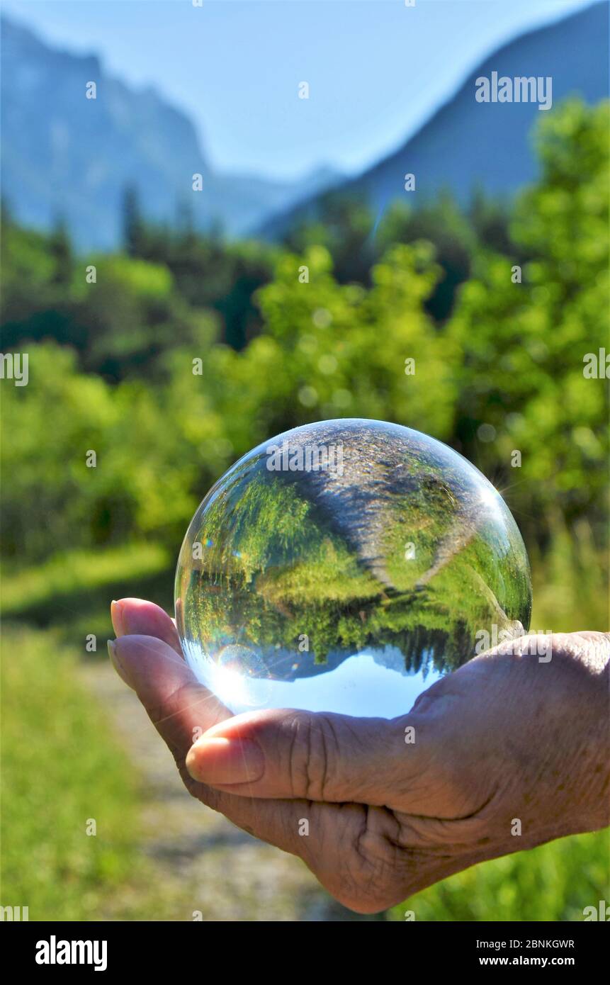 hand with crystal sphere Stock Photo - Alamy