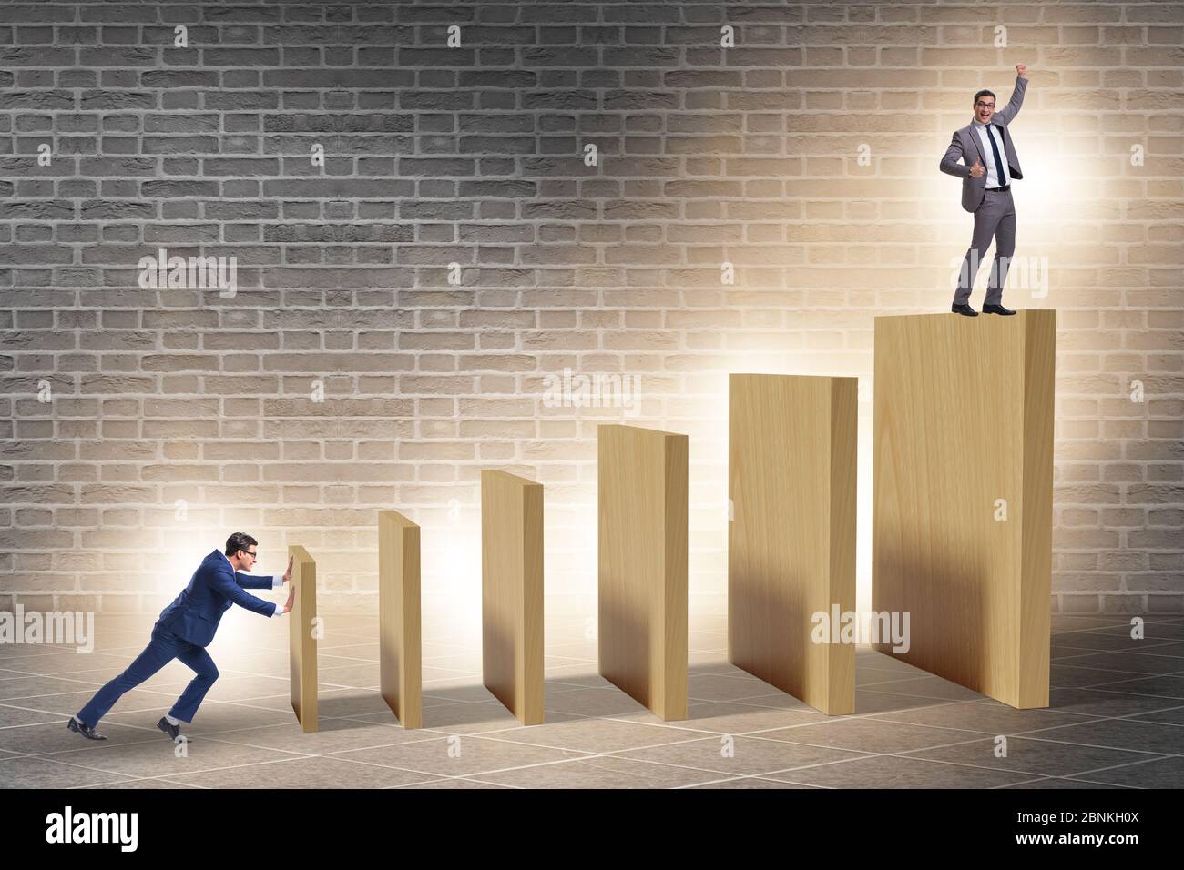 Domino effect and the competition concept Stock Photo - Alamy