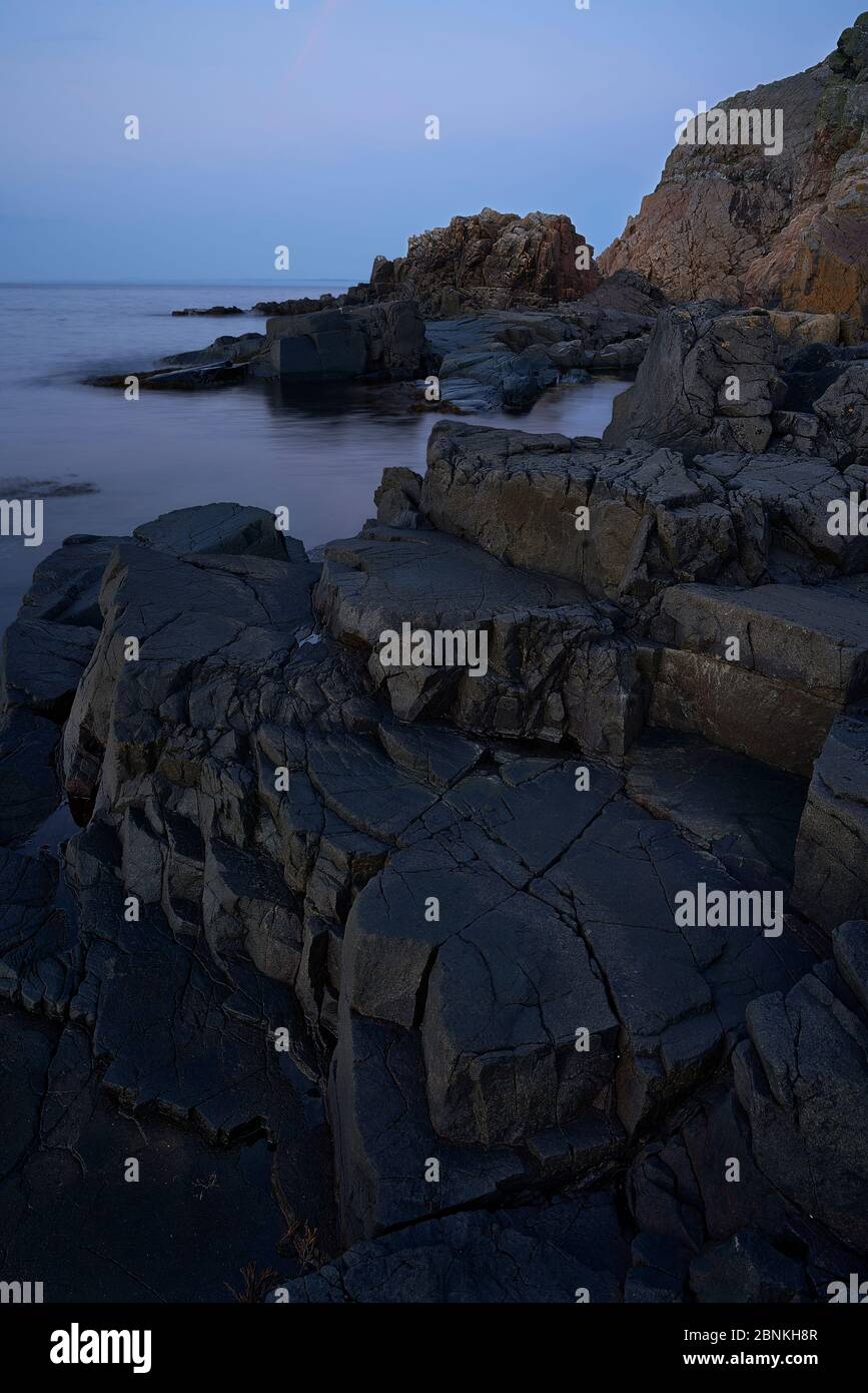 Sea cliff and boulders hi-res stock photography and images - Alamy