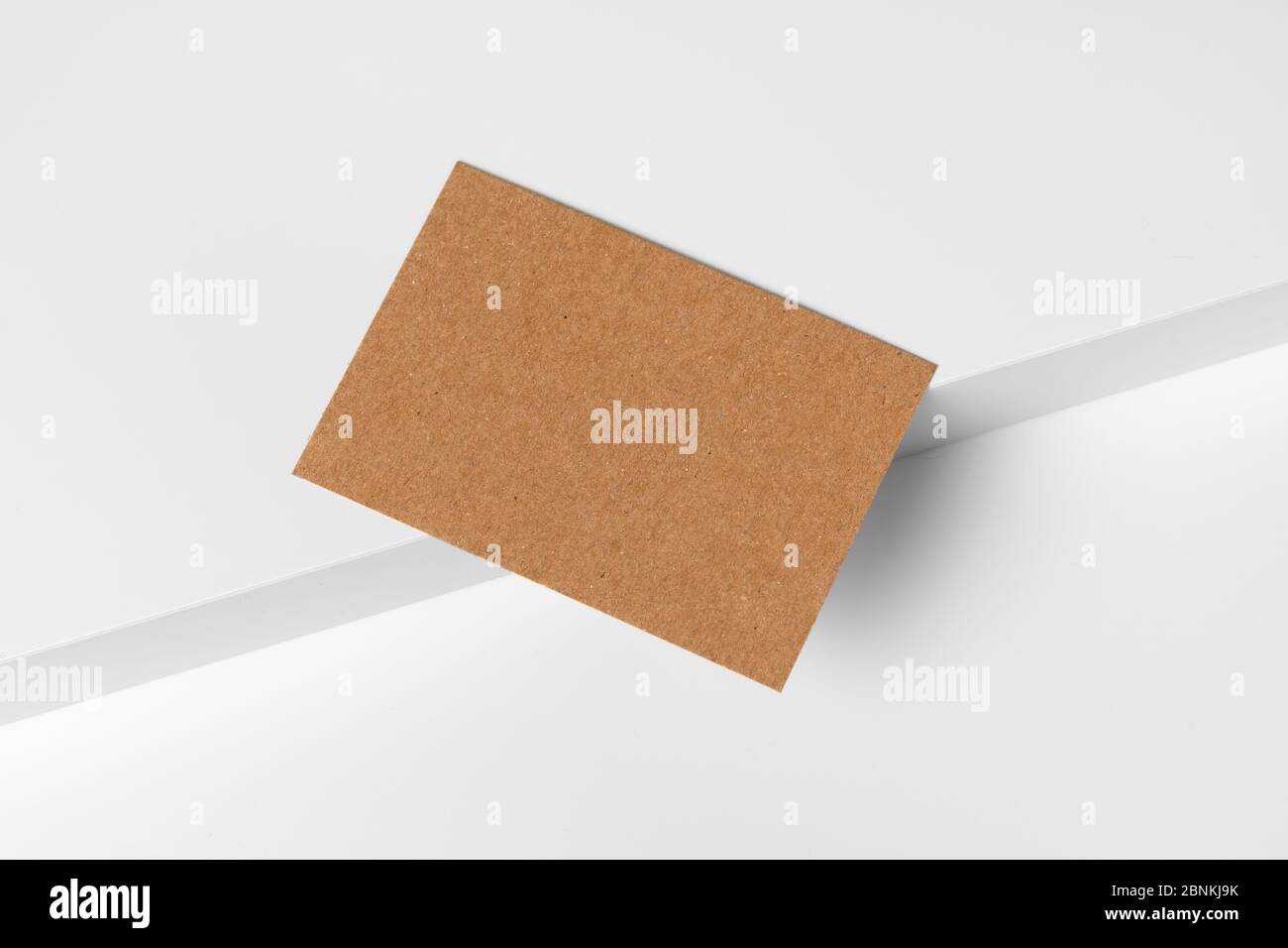 Empty craft business cards on white background Stock Photo - Alamy