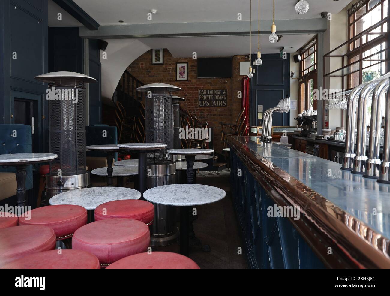 Empty pub in lockdown hi-res stock photography and images - Alamy