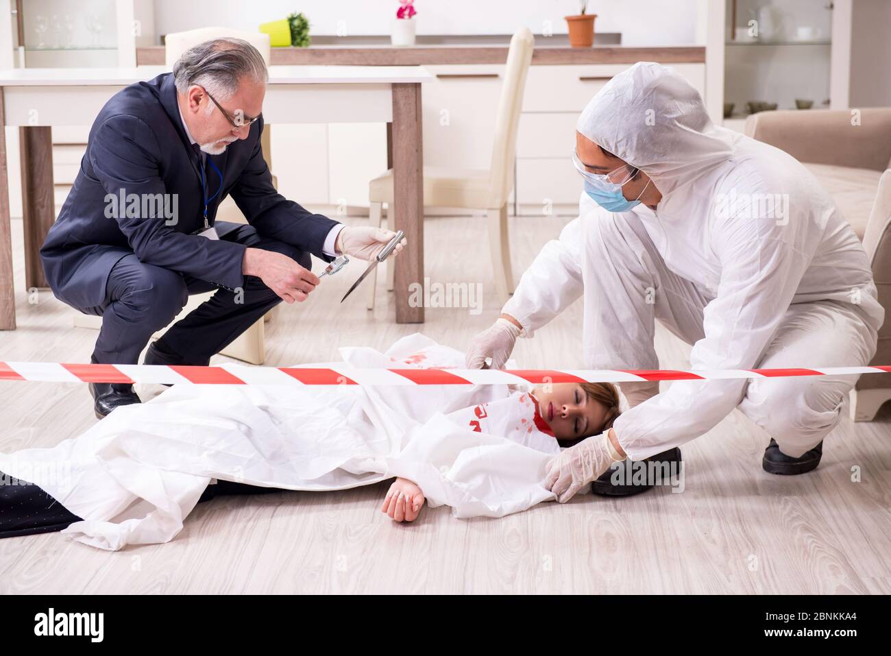 Forensic experts at the crime scene at home Stock Photo - Alamy