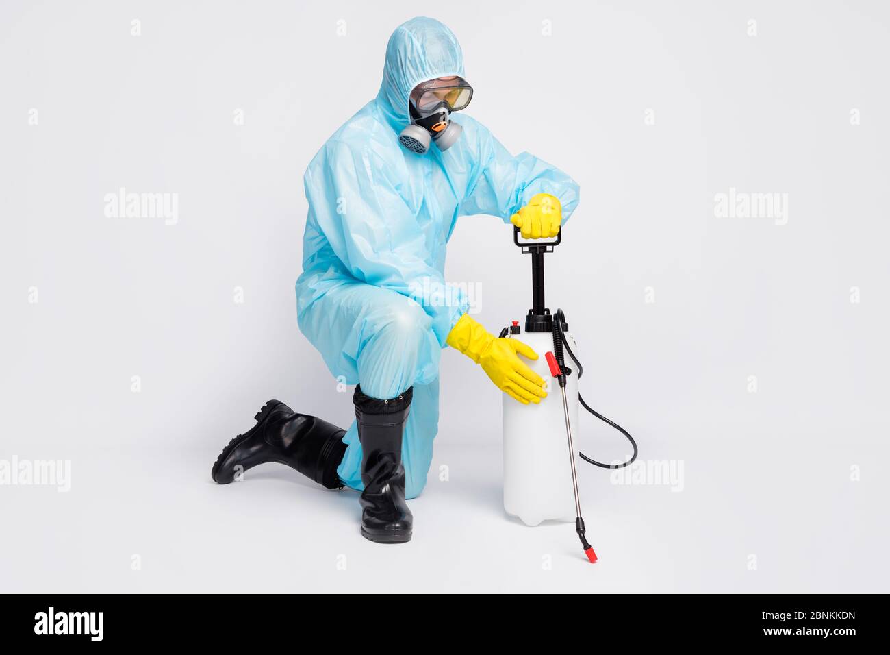 Full size photo of medical worker man disinfect house covid infection ...