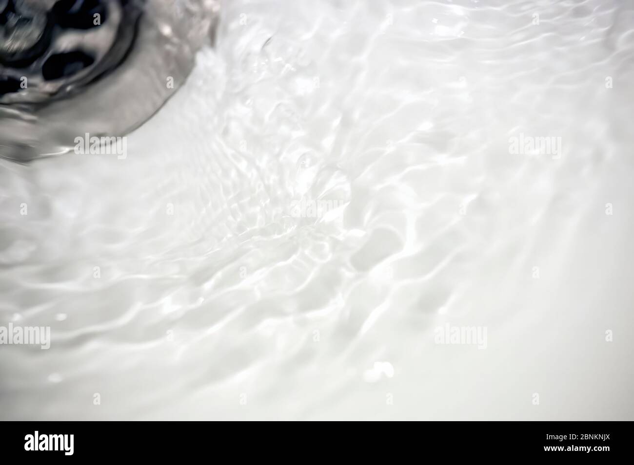 water flow into drain in bath Stock Photo - Alamy