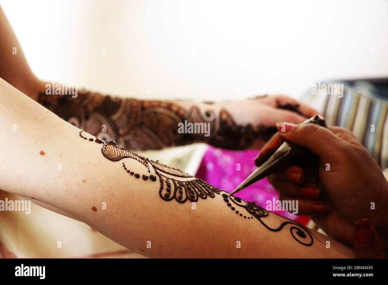 Applying Henna before Wedding Celebration in India Stock Photo - Alamy