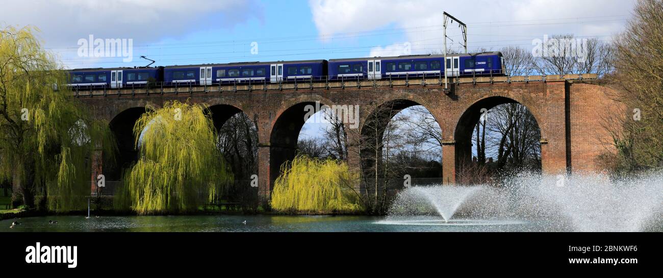 Greater Anglia train passing over the viaduct in Central Park ...