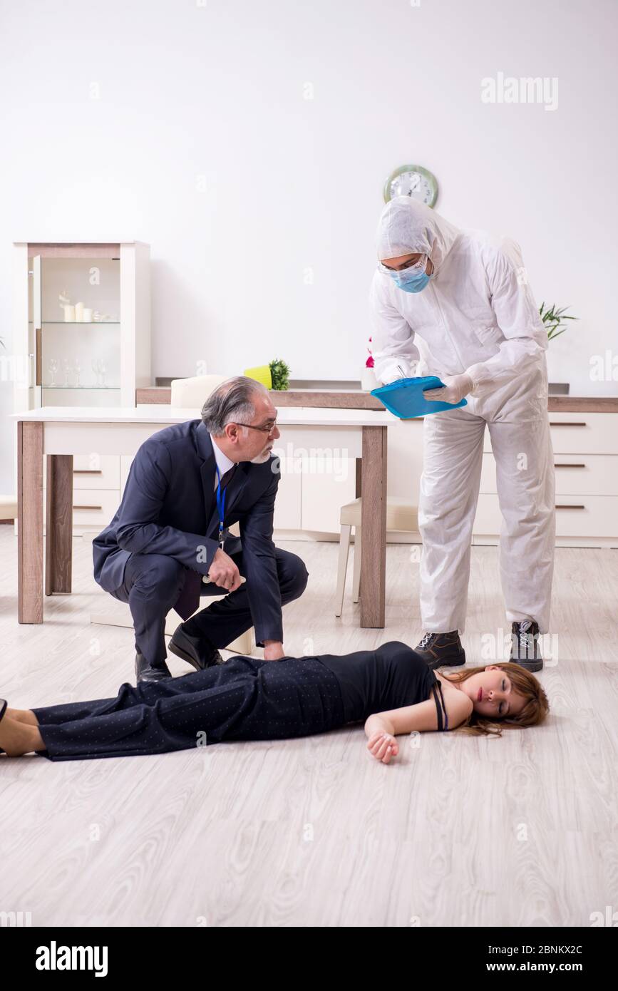 Forensic experts at the crime scene at home Stock Photo - Alamy