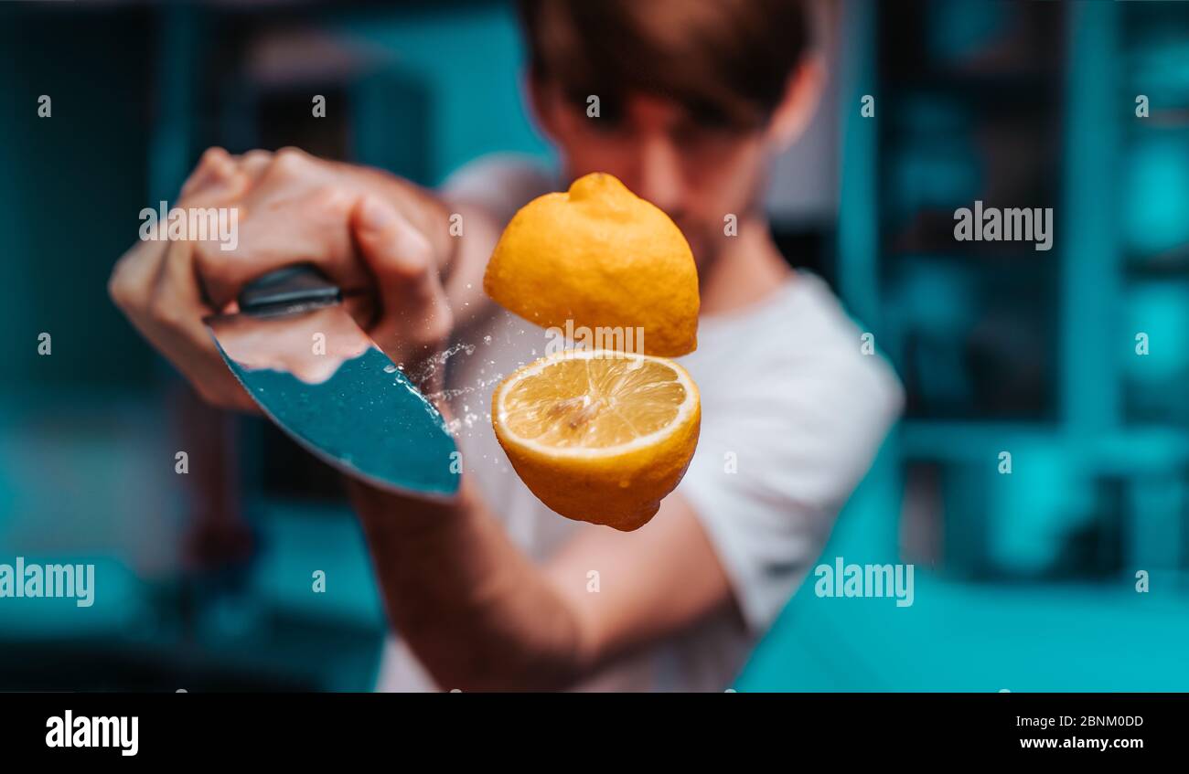 Slicing fresh juicy lemon, levitation Stock Photo - Alamy
