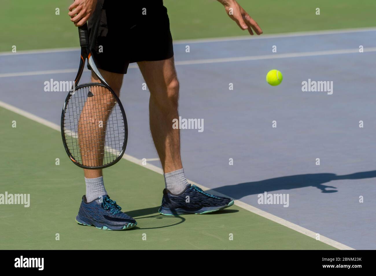 Strong male tennis player hi-res stock photography and images - Alamy
