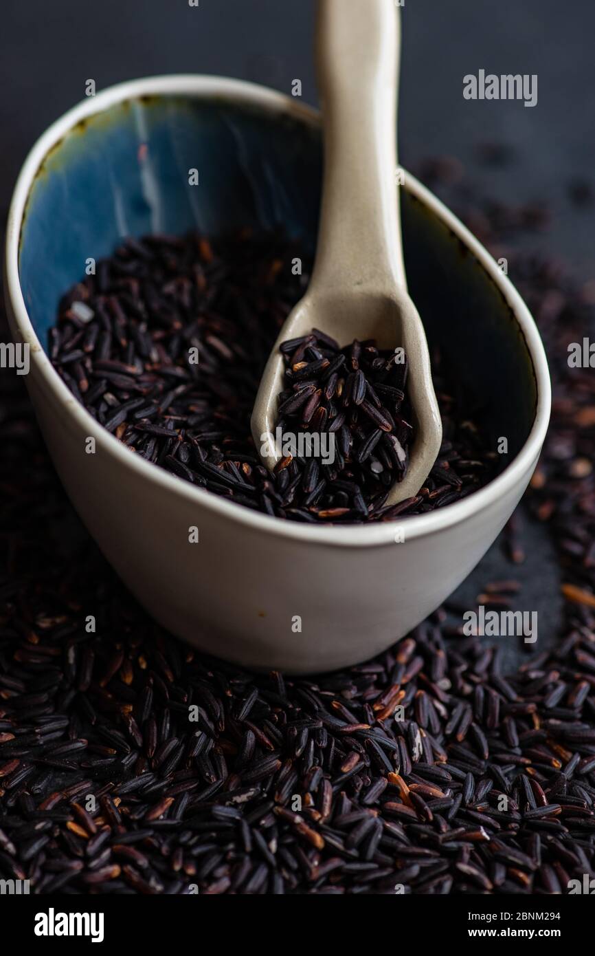 Organic black rice Stock Photo - Alamy