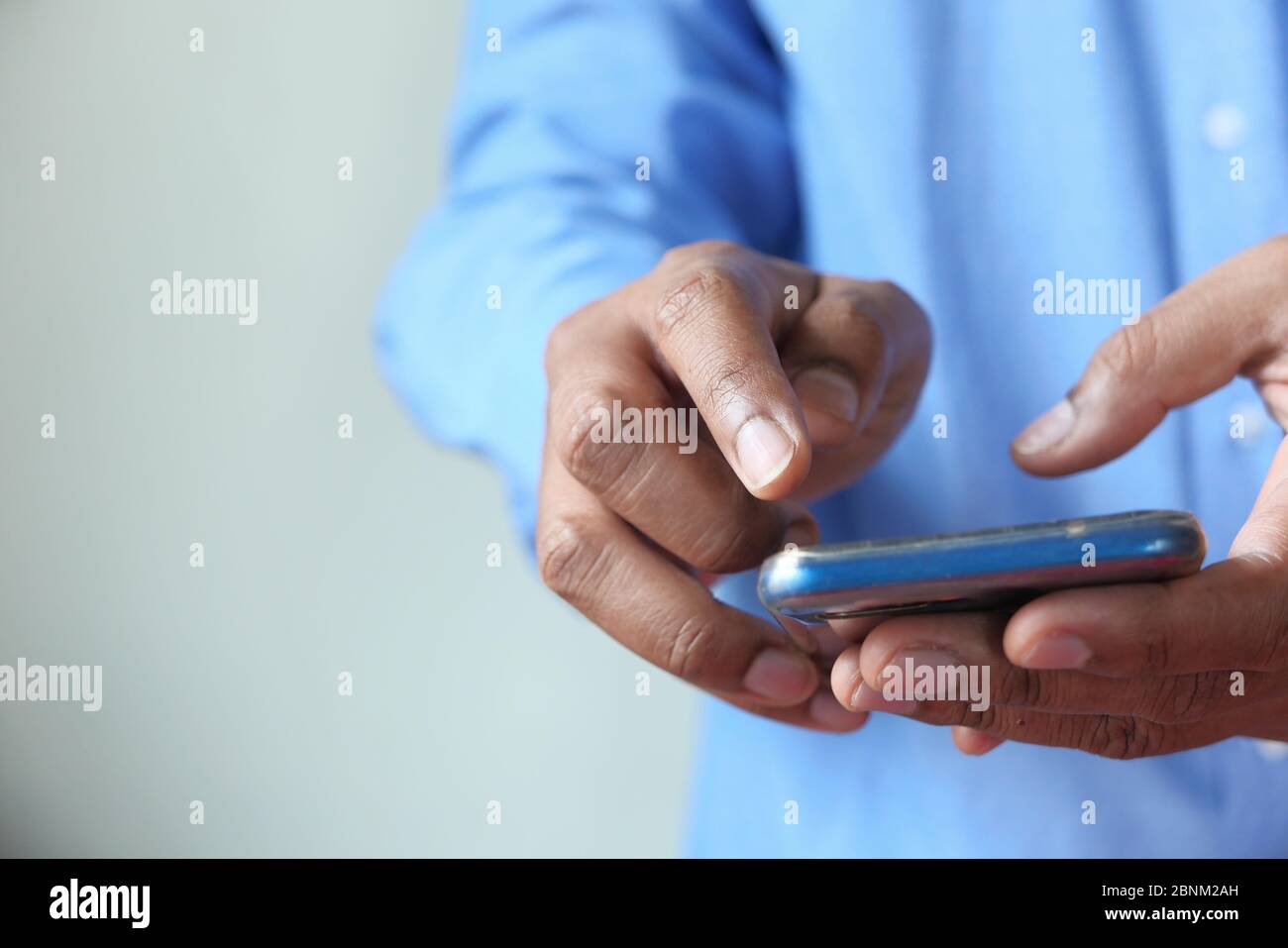Close up of a man using mobile smart phone Stock Photo - Alamy