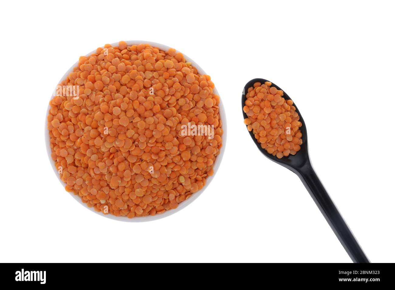Close up of Orange Masoor Dal (Red Chief) lentil lens isolated on white ...