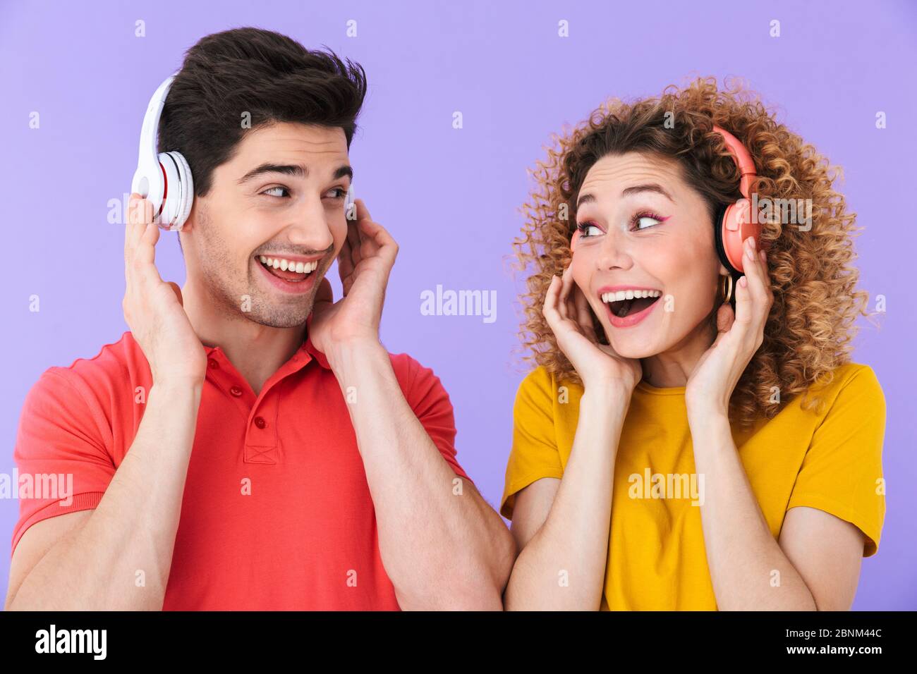 Portrait of pleased caucasian people man and woman smiling while ...