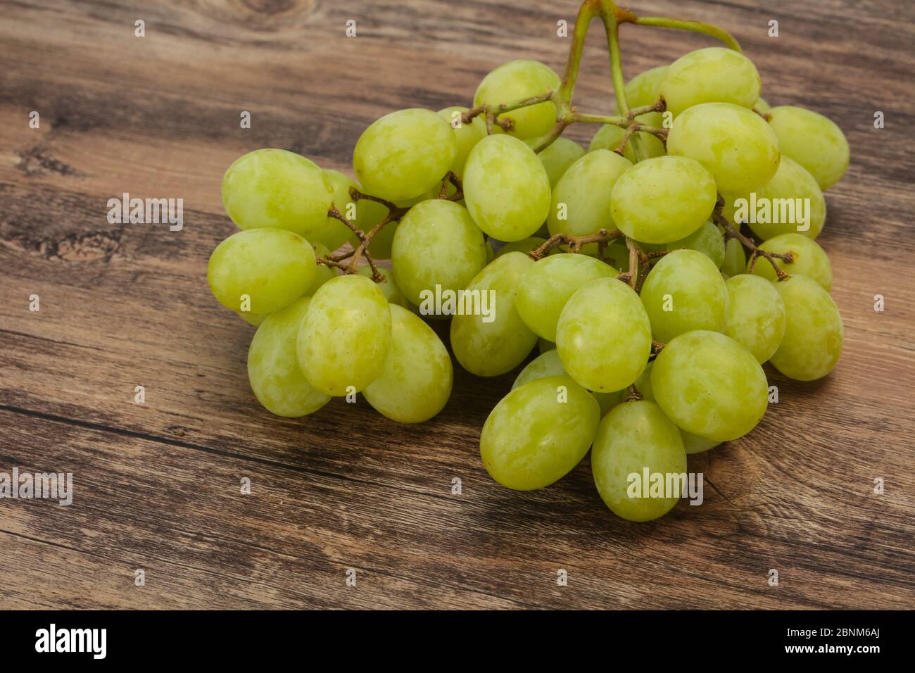 Sweet ripe fresh Green grape branch Stock Photo - Alamy