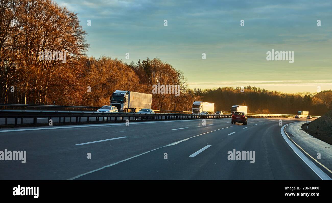 Motorway, truck, car, curve Stock Photo - Alamy