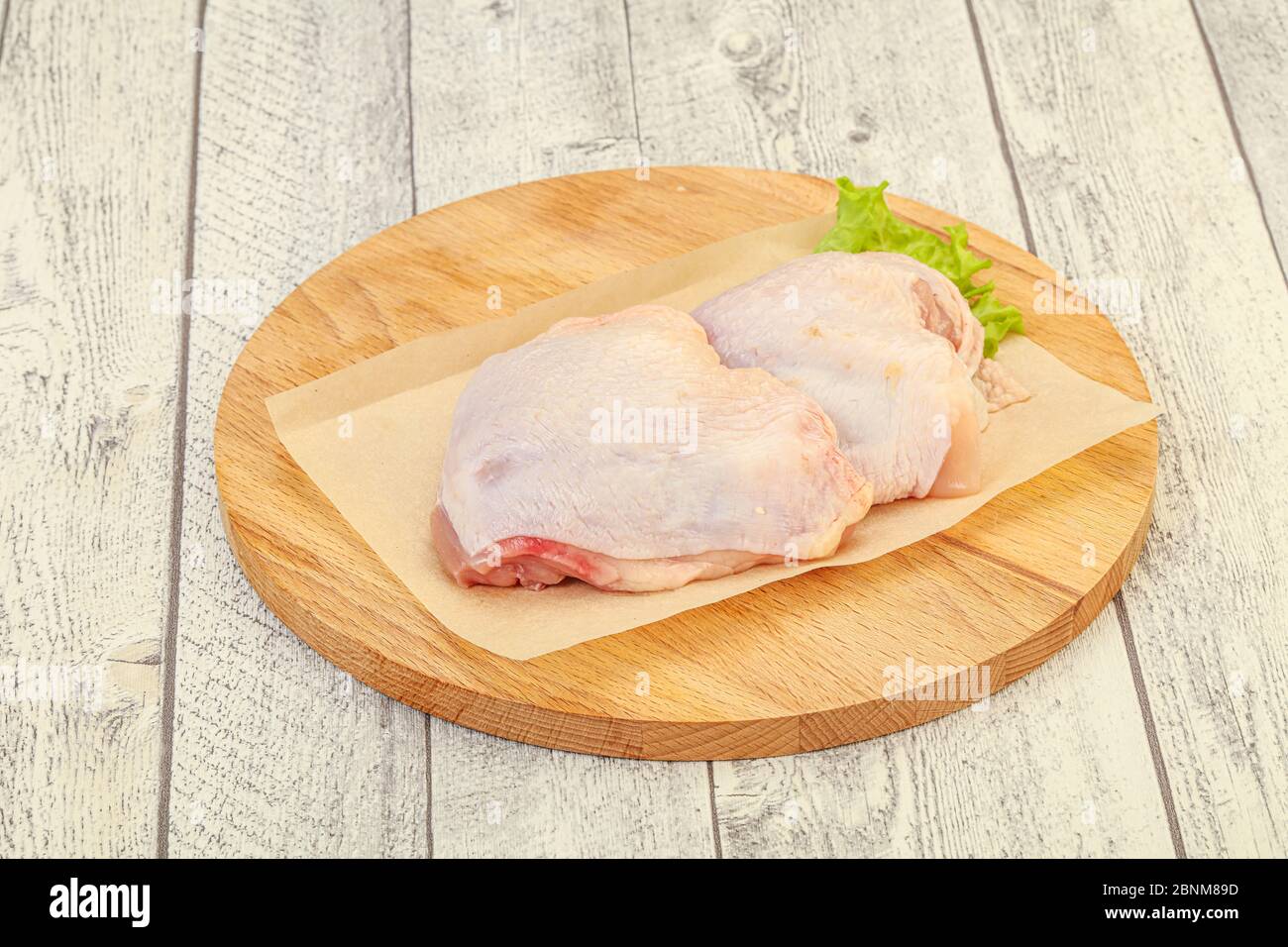 Raw chicken hip ready for cooking Stock Photo - Alamy