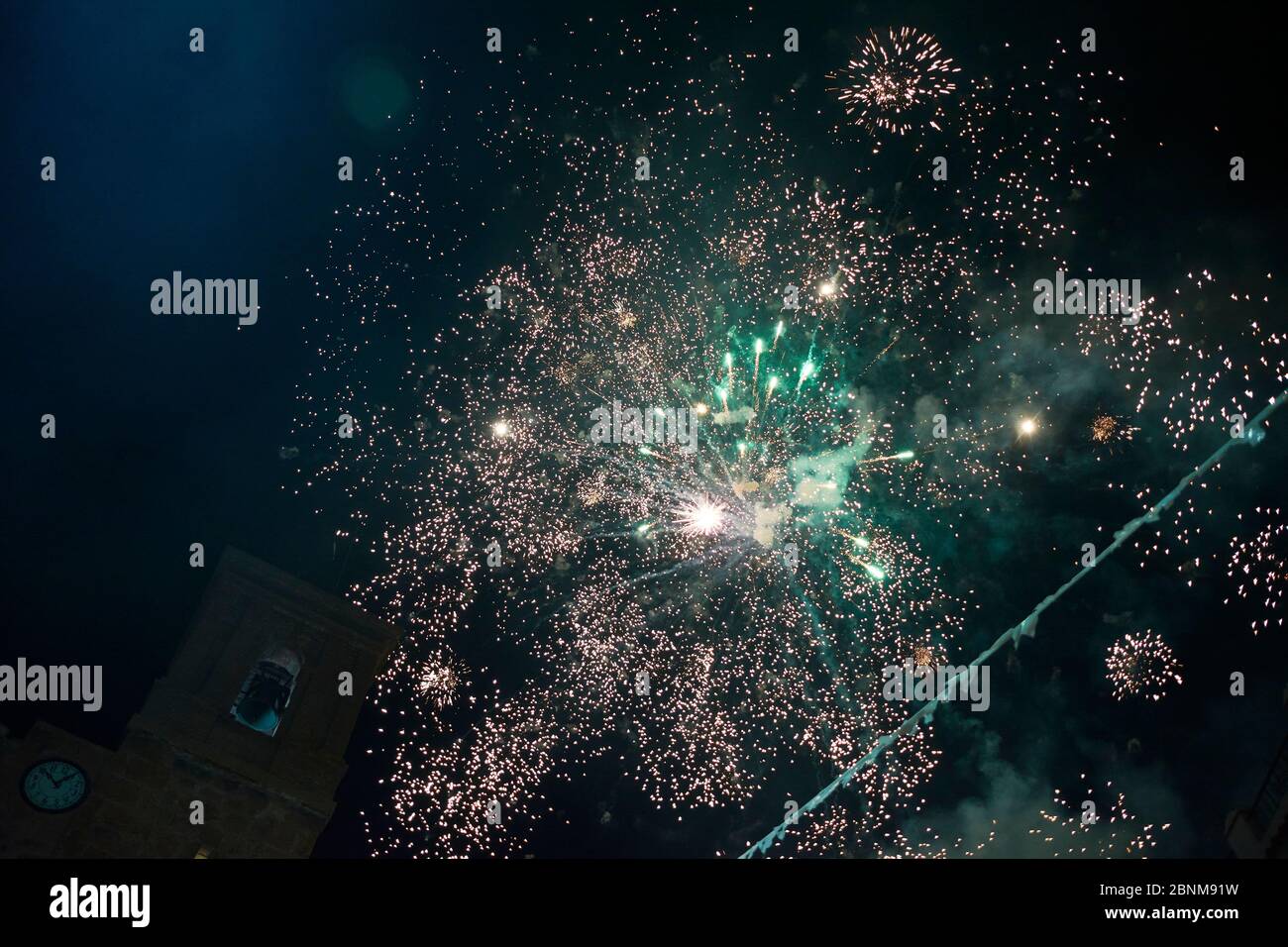 Colorful fireworks on a hot summer night, Colors of men Stock Photo - Alamy