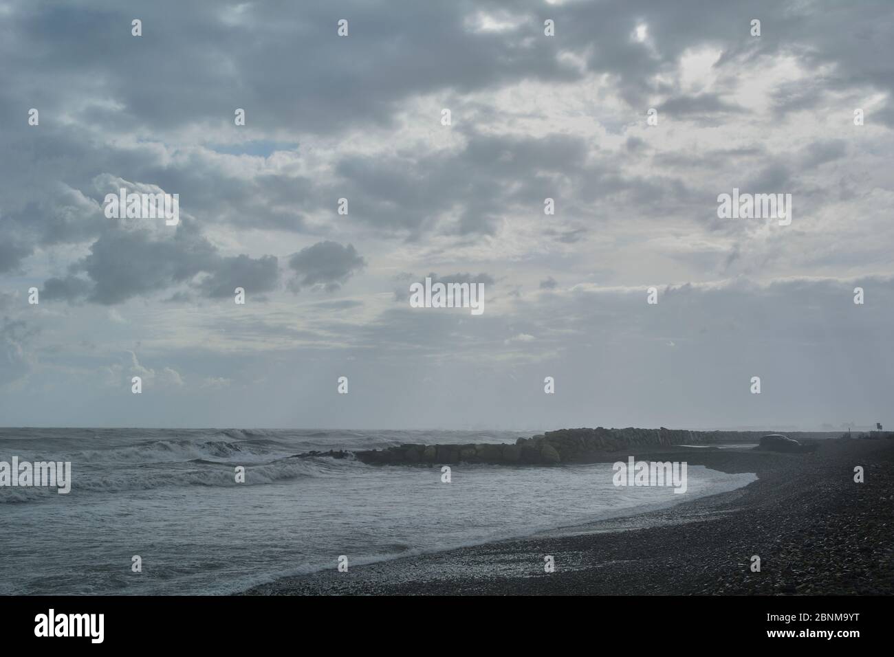 The great beach on a stormy day. Colors of nature Stock Photo - Alamy