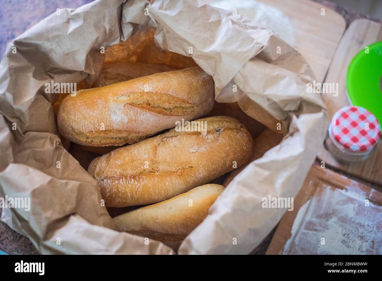 Fresh hand made bread inside a paper bag Stock Photo - Alamy