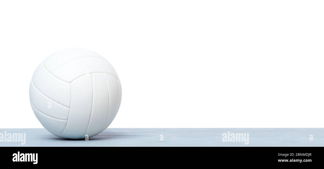 Close up of volleyball ball on grey wooden floor Stock Photo - Alamy