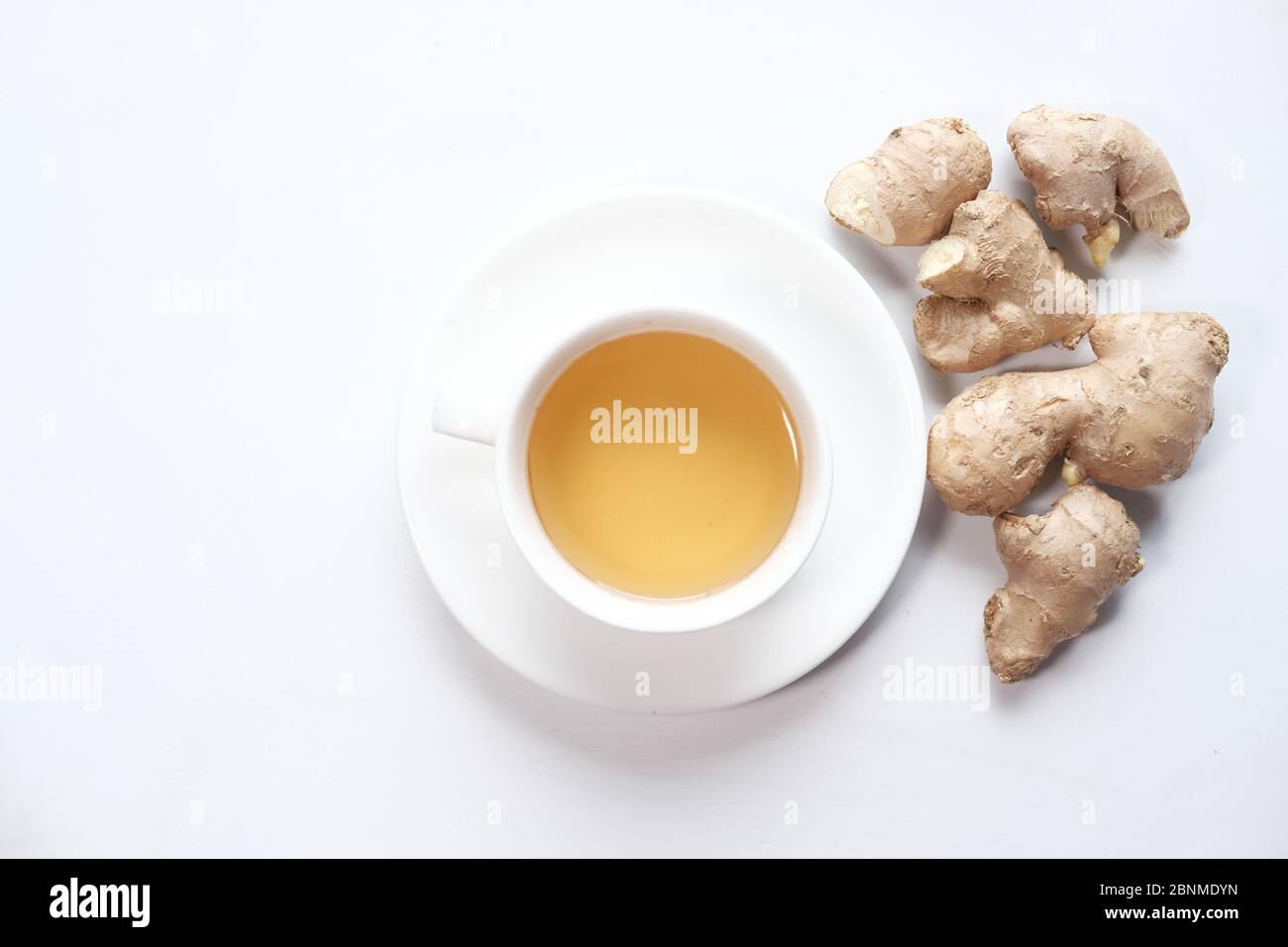Top view of ginger tea on white background Stock Photo - Alamy