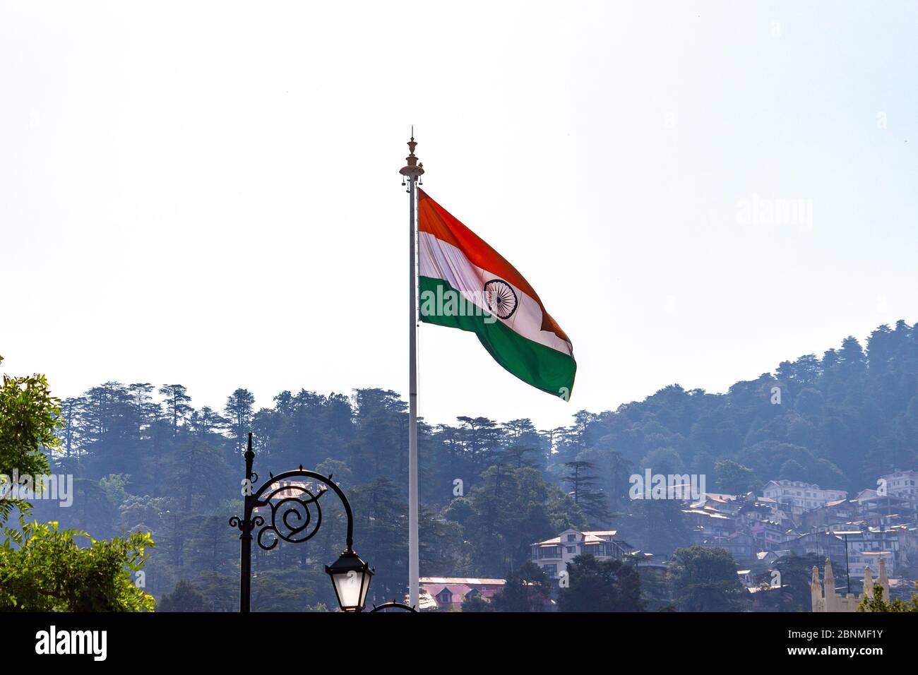 Indian National Flag waving high in the high mountains of Shimla mall ...