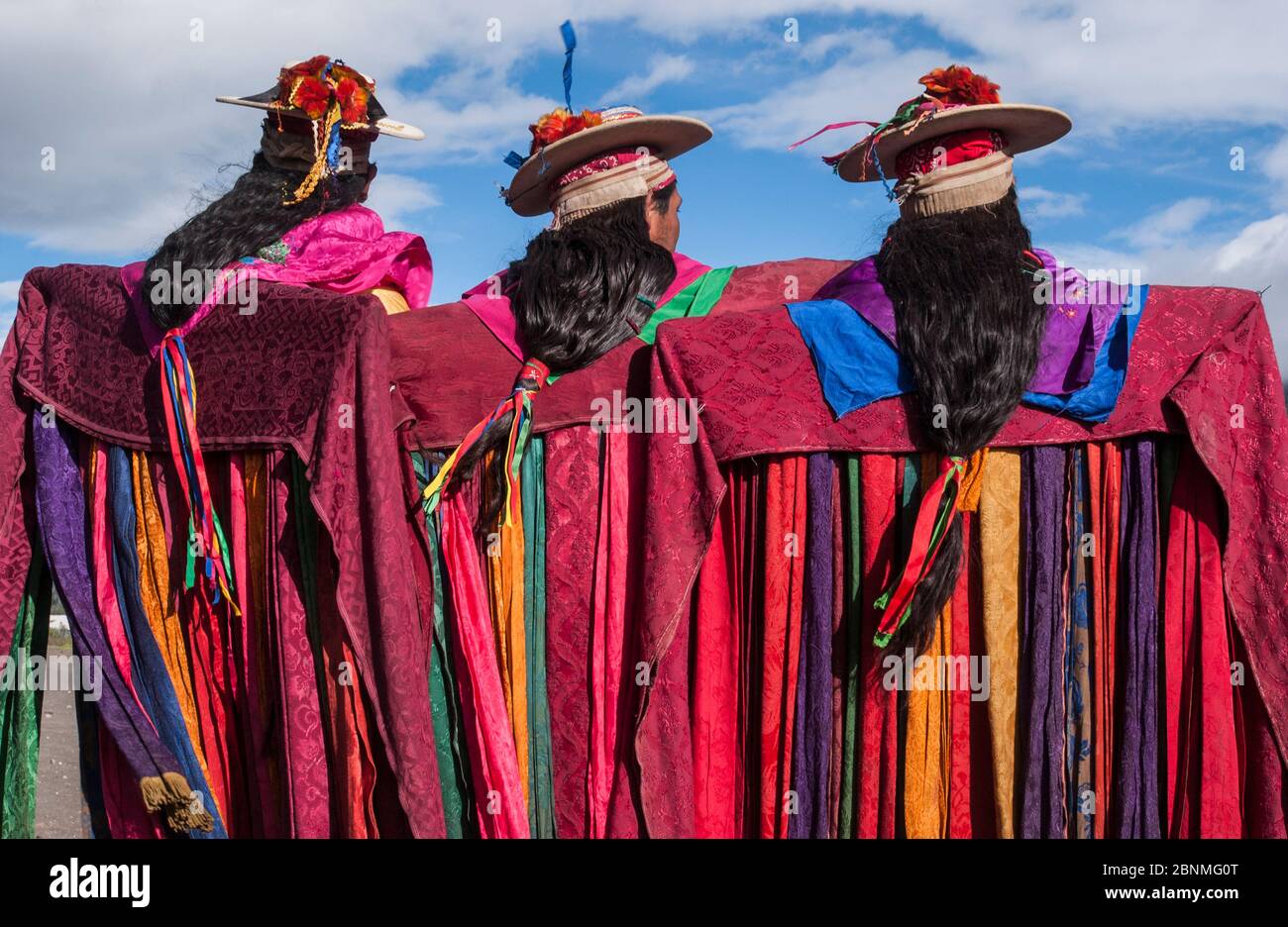 Indigenous Salasaca Indians in colourful garments, celebrating the Inti ...