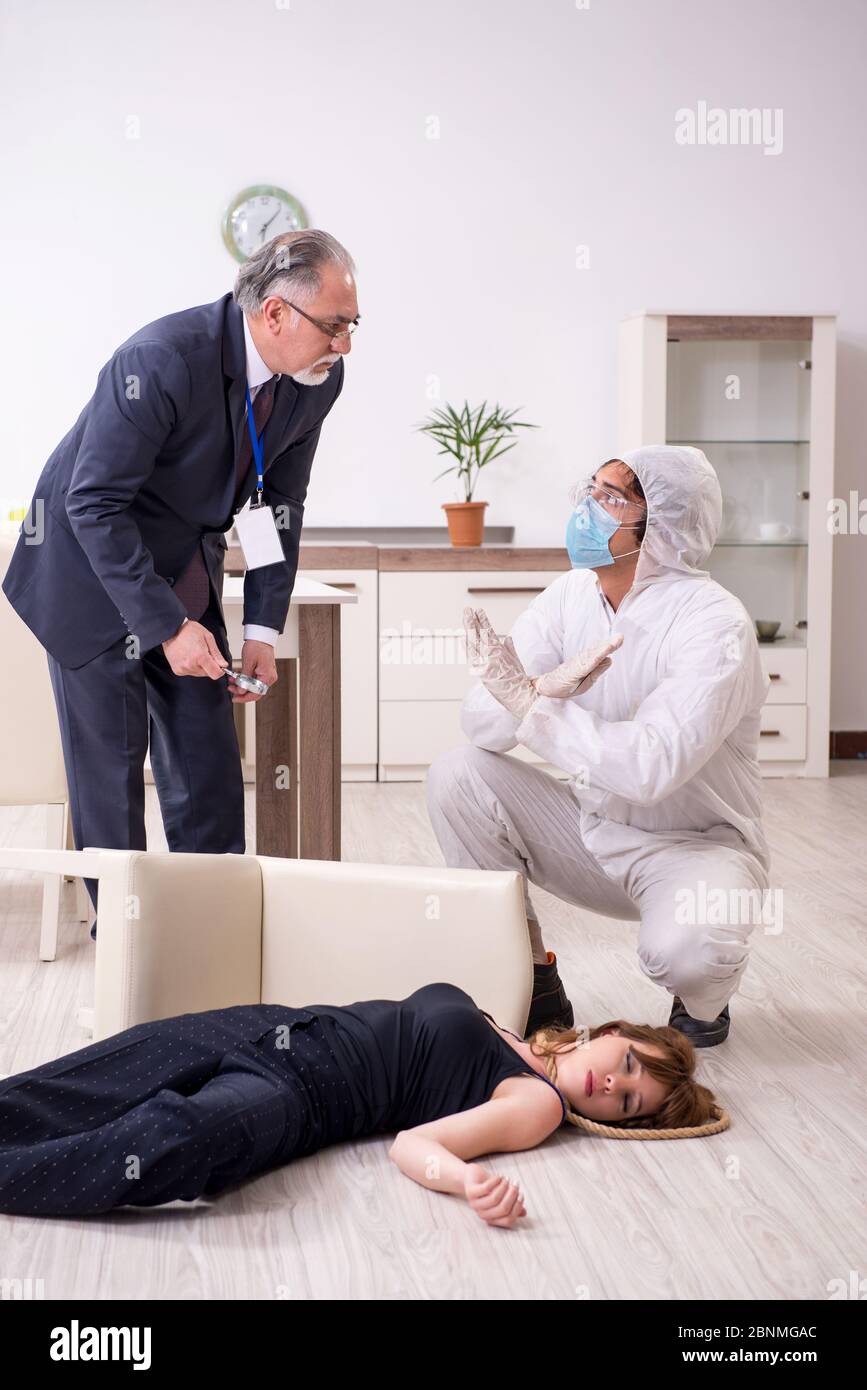 Forensic experts at the crime scene at home Stock Photo - Alamy