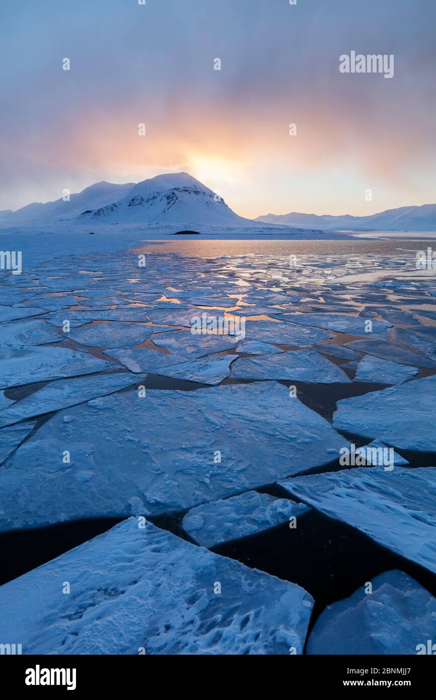 First midnight sun in late winter at Isfjorden, Svalbard, Spitsbergen ...