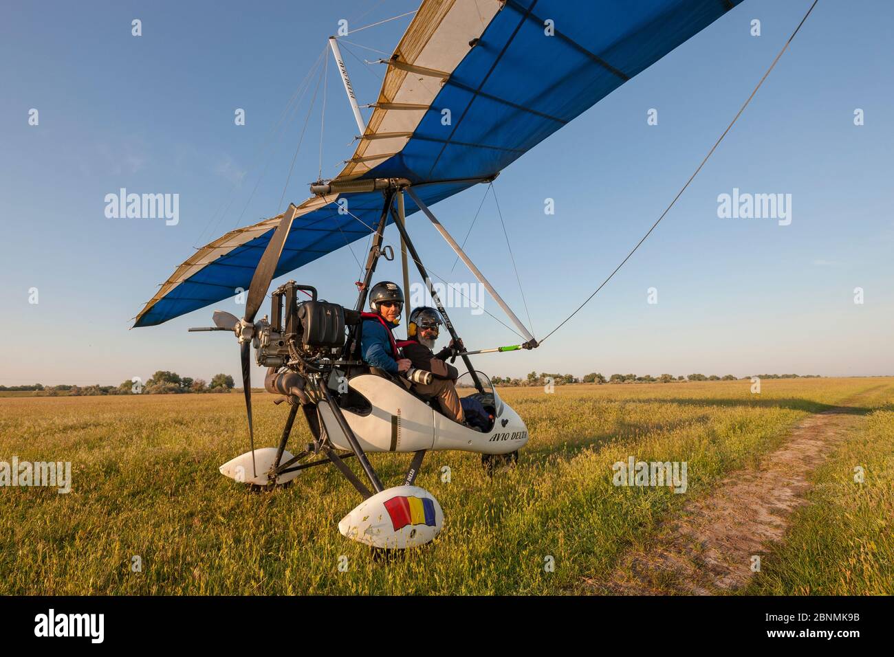 Wildlife Photographer Ingo Arndt and pilot in ultralight aircraft for ...