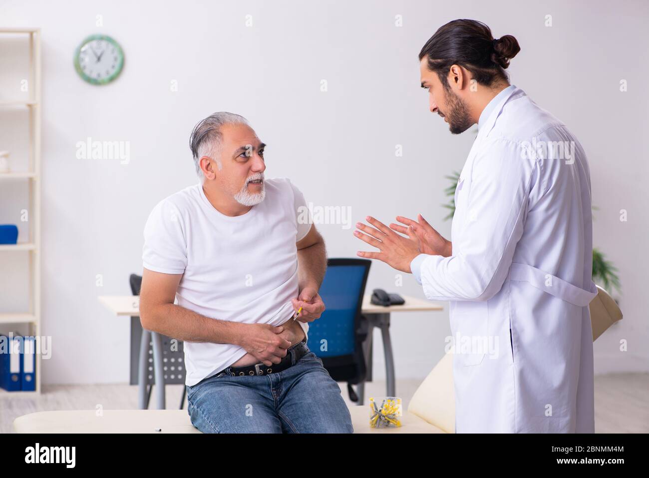 Patient suffering from the diabetes visiting doctor Stock Photo - Alamy