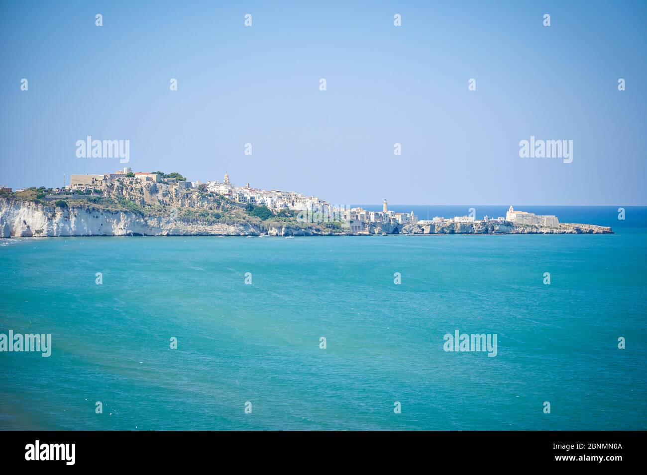 panoramic landscape of the beach and the white cliffs of Vieste ...