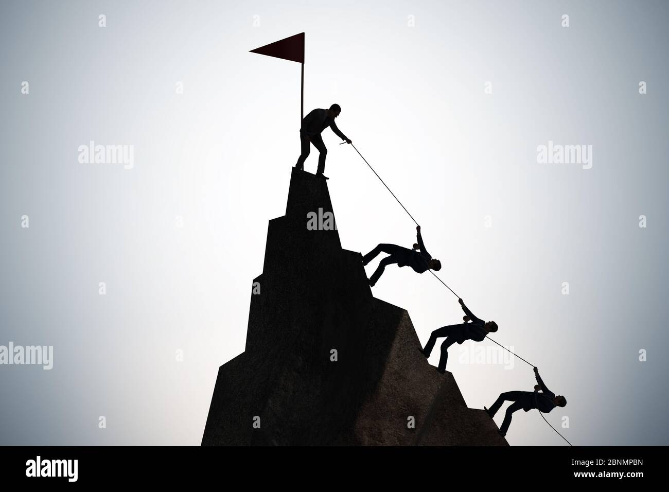 Concept of teamwork with team climbing mountain Stock Photo - Alamy