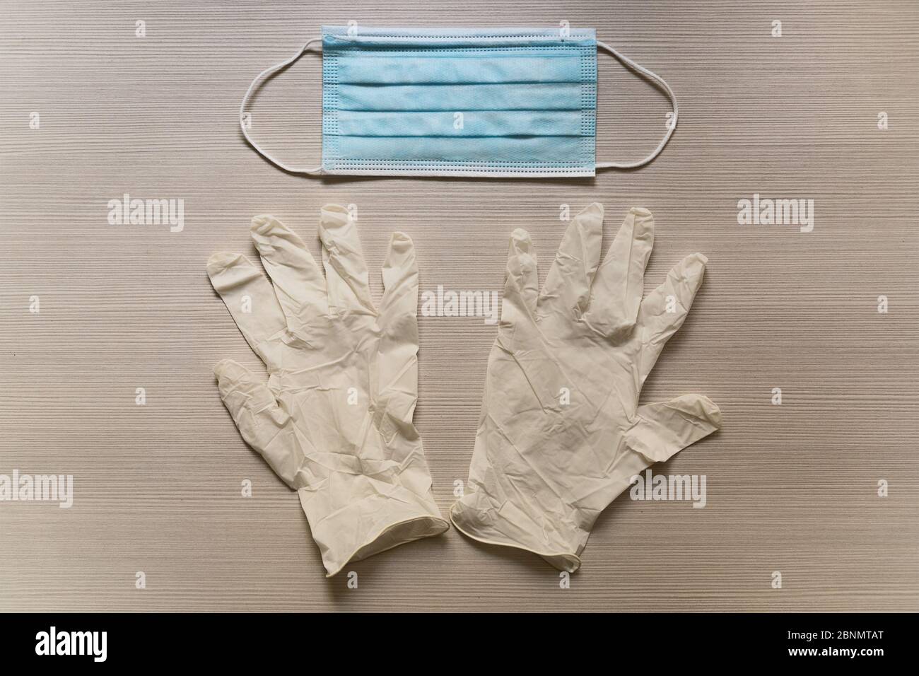 Ear-loop face mask and hand plastic gloves, Safety masks. dust ...