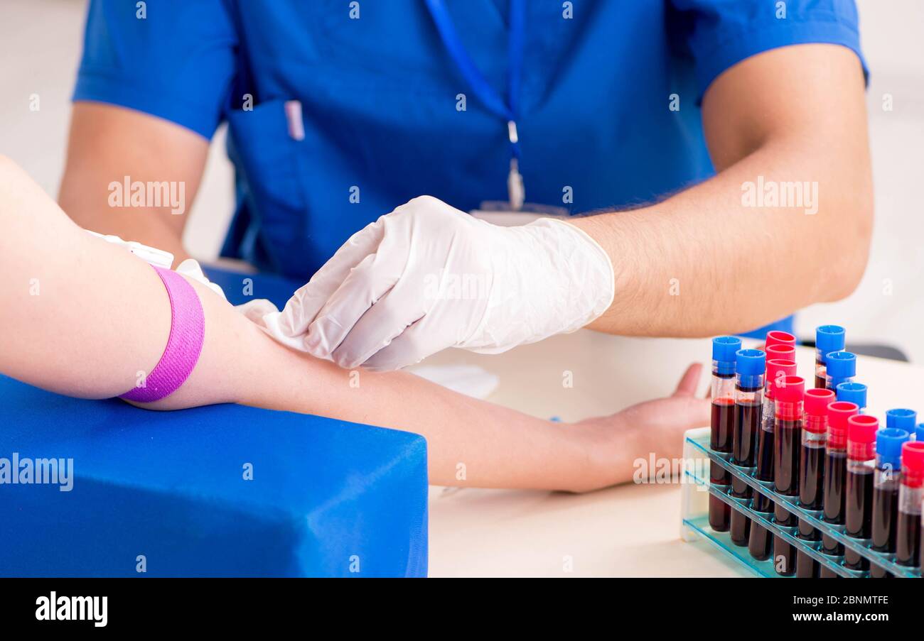 The young patient during blood test sampling procedure Stock Photo - Alamy