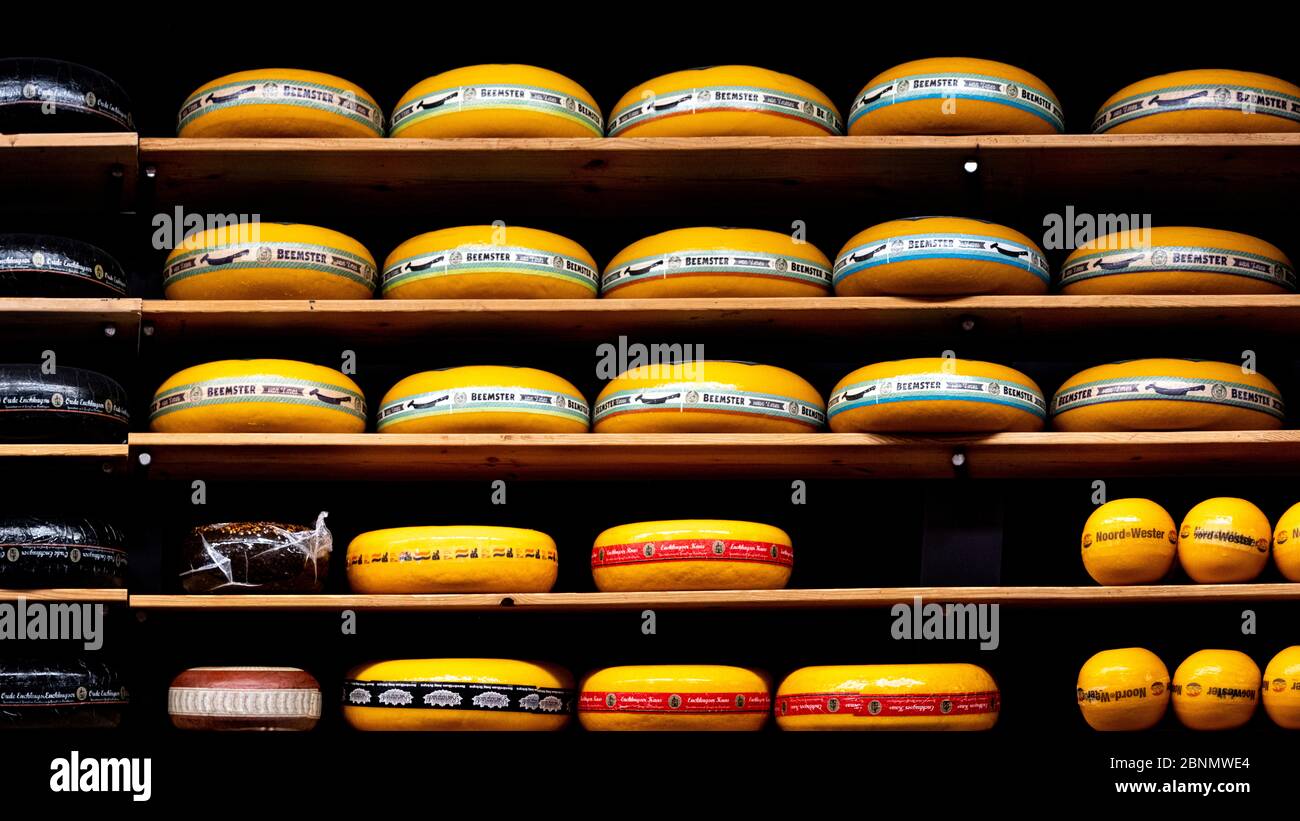 Shelf, cheese wheels, panorama Stock Photo - Alamy