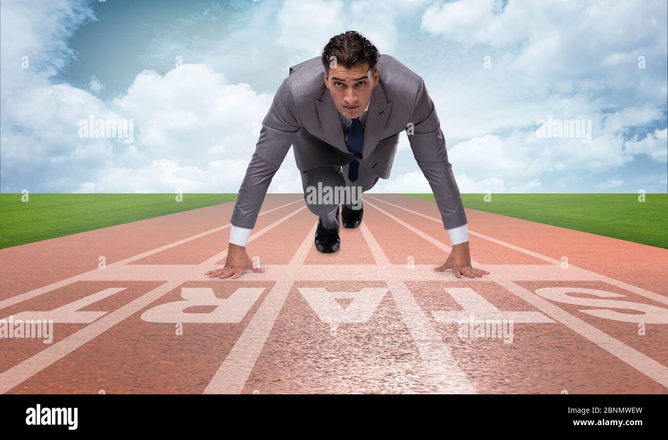 The businessman taking low start to running Stock Photo - Alamy