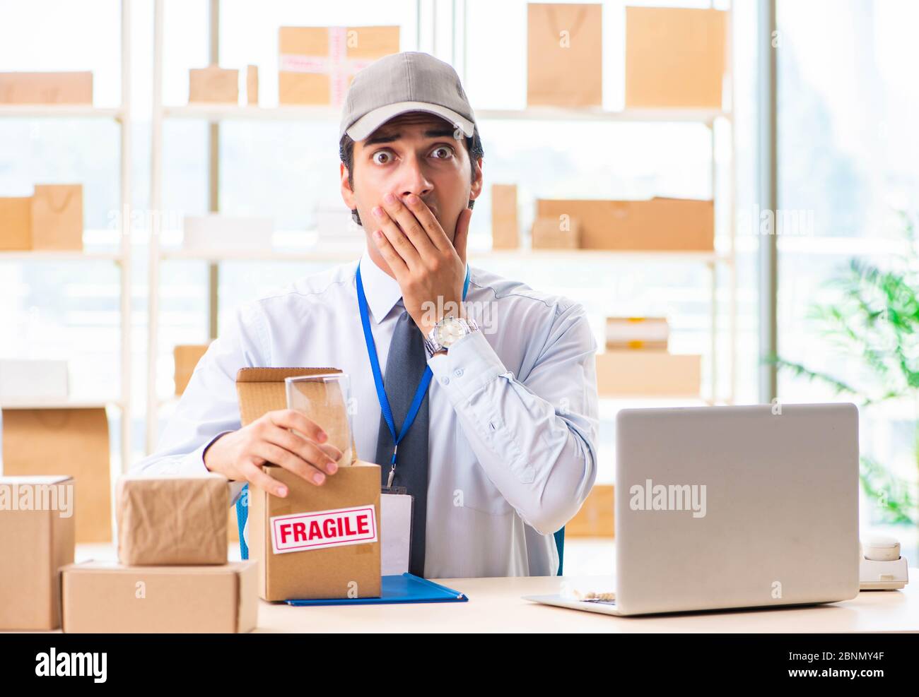 The male employee working in box delivery relocation service Stock ...