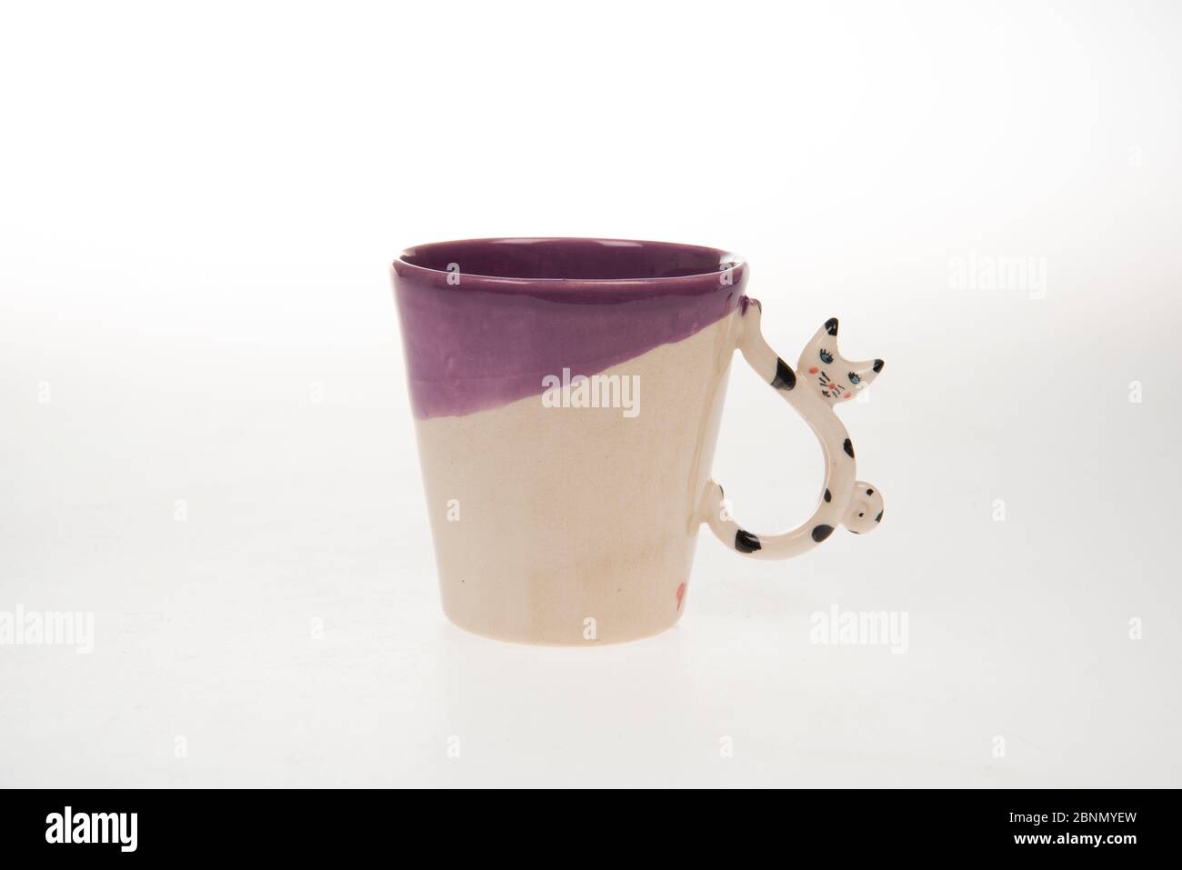 Design ceramic coffee cups on white isolated Stock Photo - Alamy