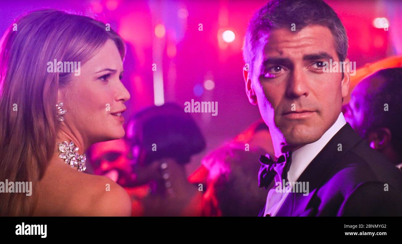 USA. George Clooney and Elle Macpherson in a scene from the ©Warner ...