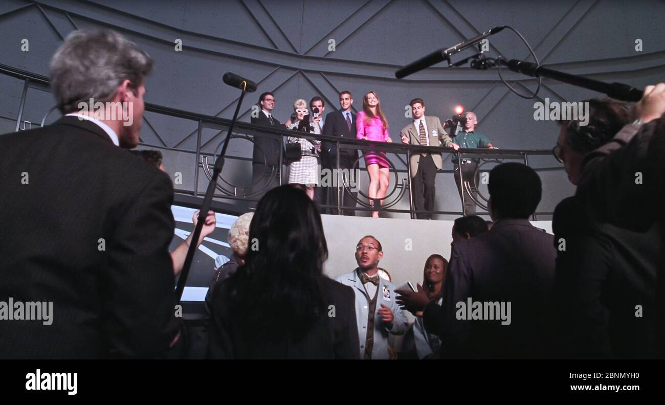 USA. George Clooney and Elle Macpherson in a scene from the ©Warner ...