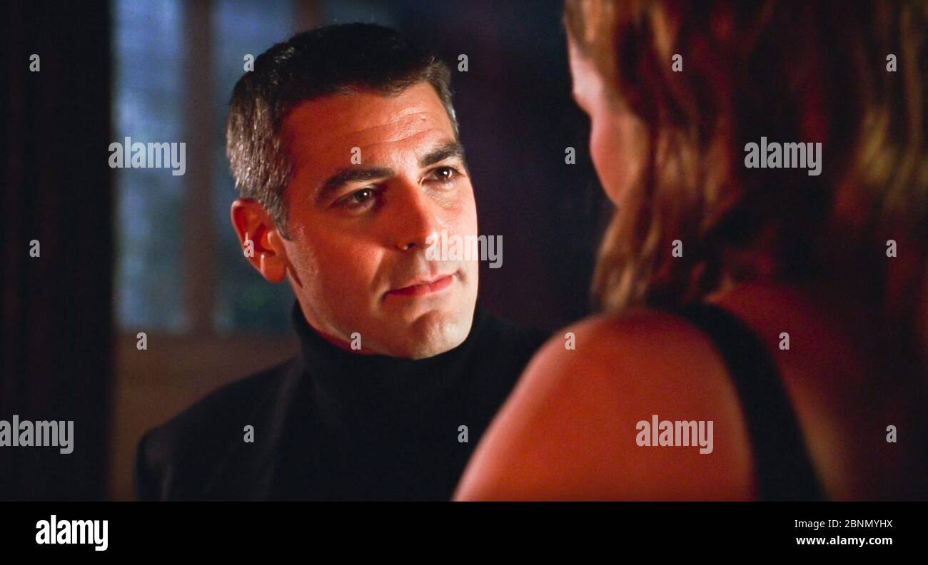 USA. George Clooney and Elle Macpherson in a scene from the ©Warner ...