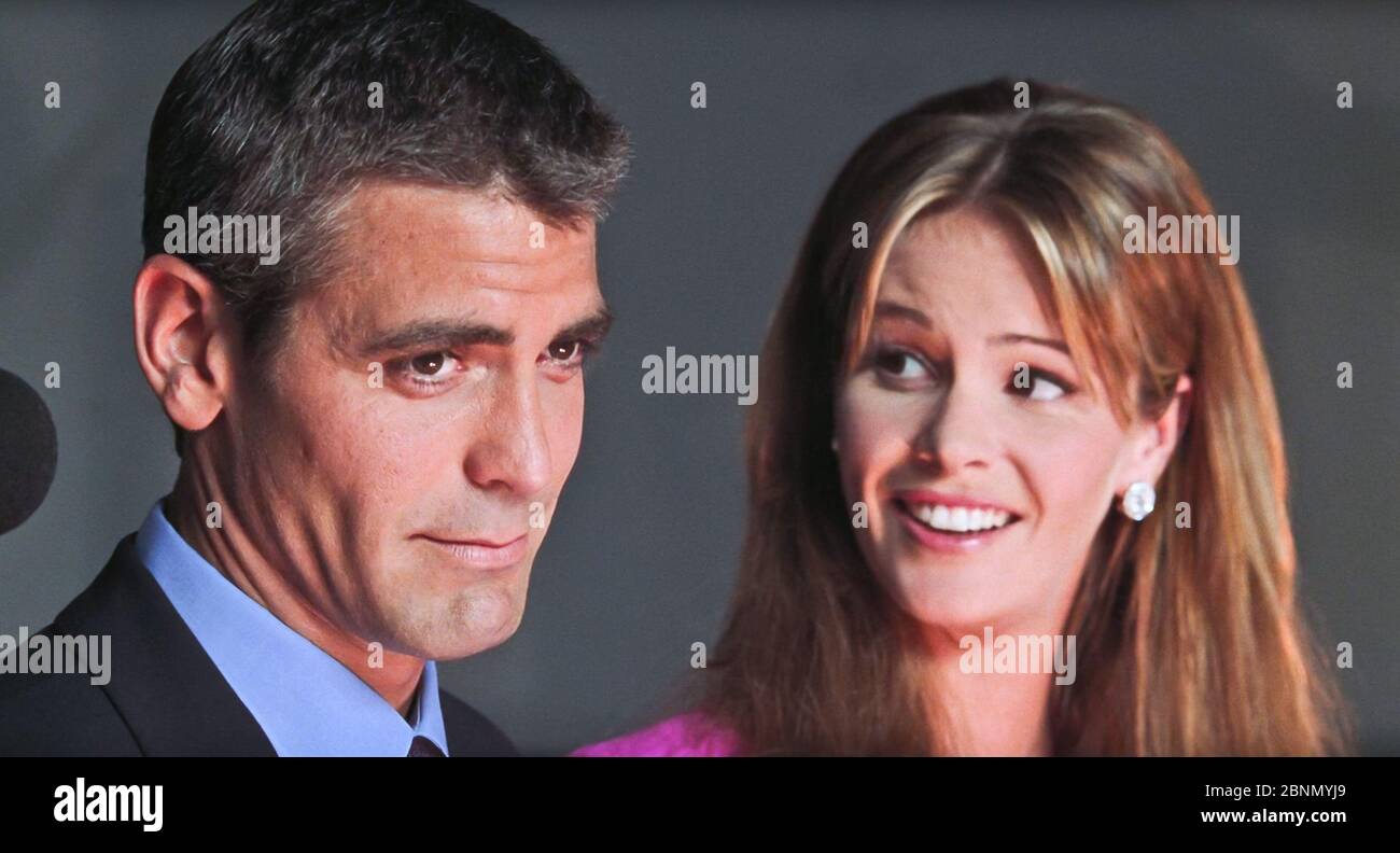 USA. George Clooney and Elle Macpherson in a scene from the ©Warner ...