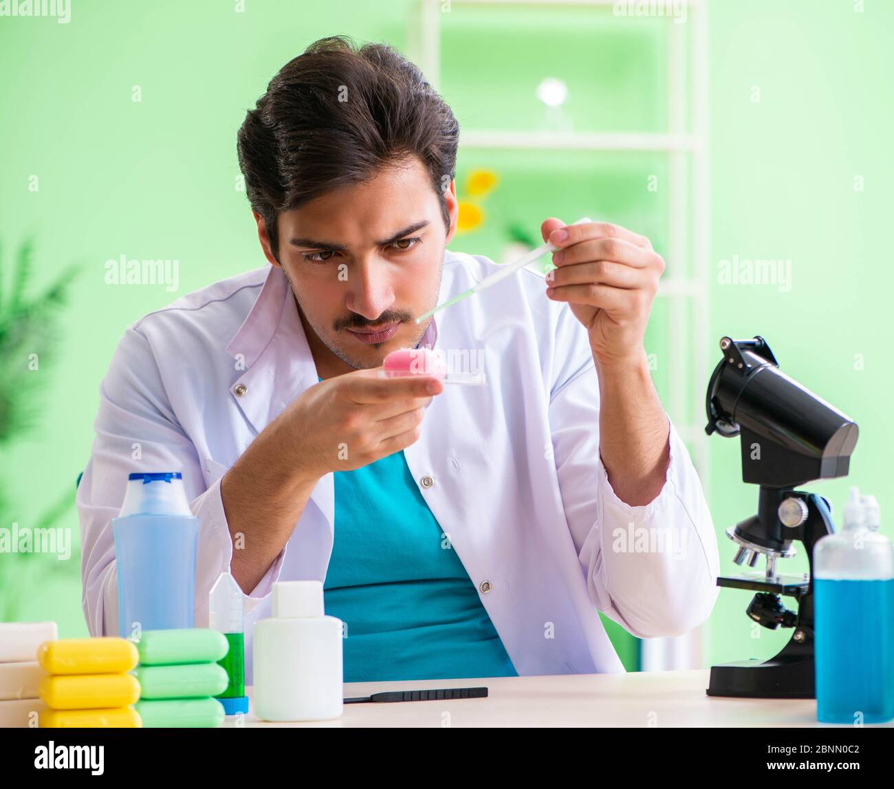 The chemist testing soap in the lab Stock Photo - Alamy
