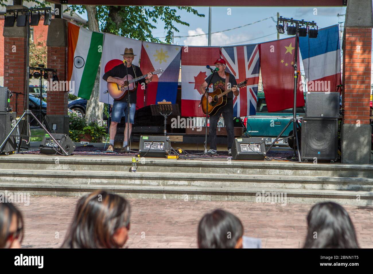 Cranbrook Multi-Cultural Festival, two musicians in front of variety of ...