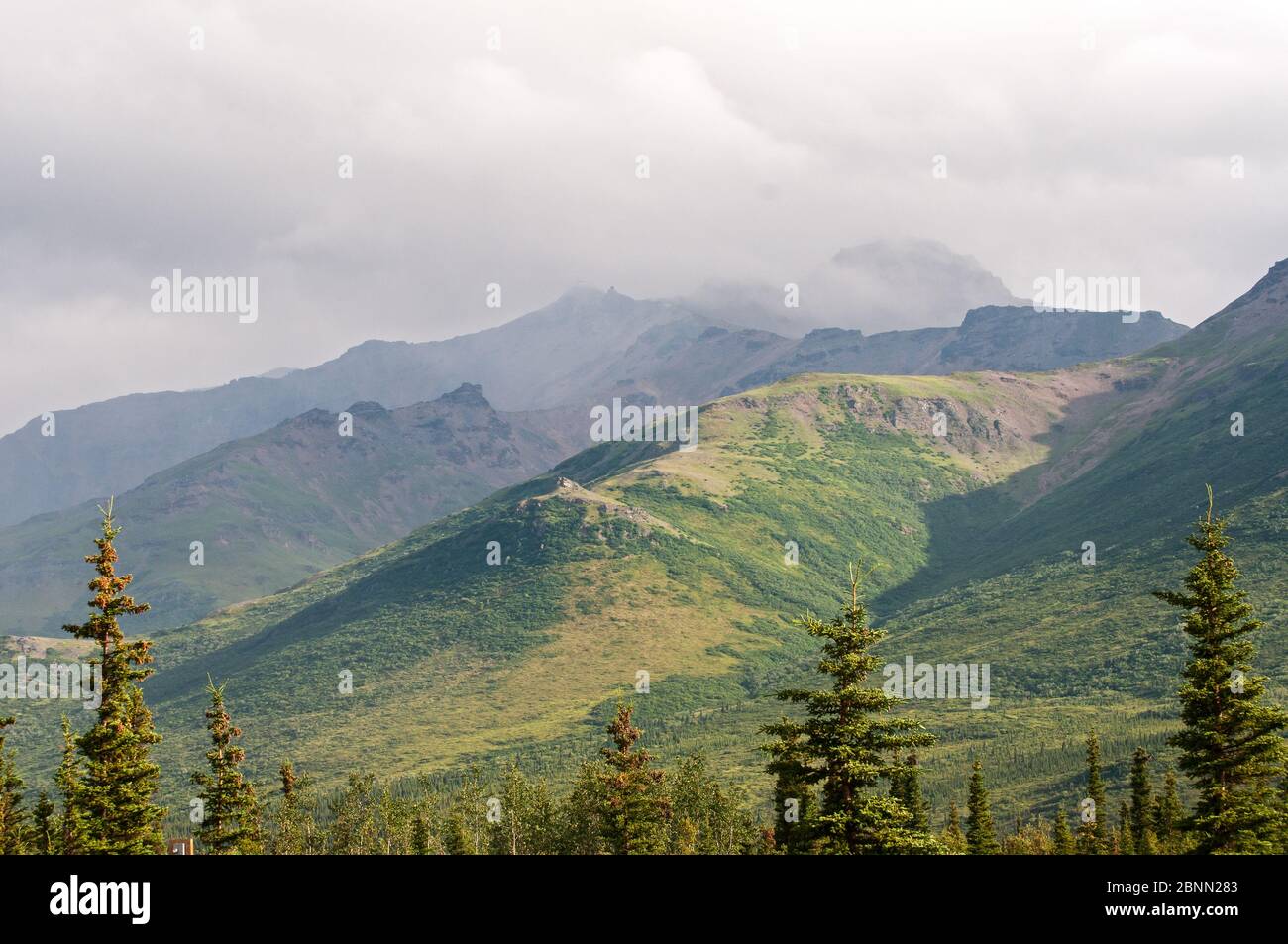 Sun rays over Denali National Park, Alaska Stock Photo - Alamy