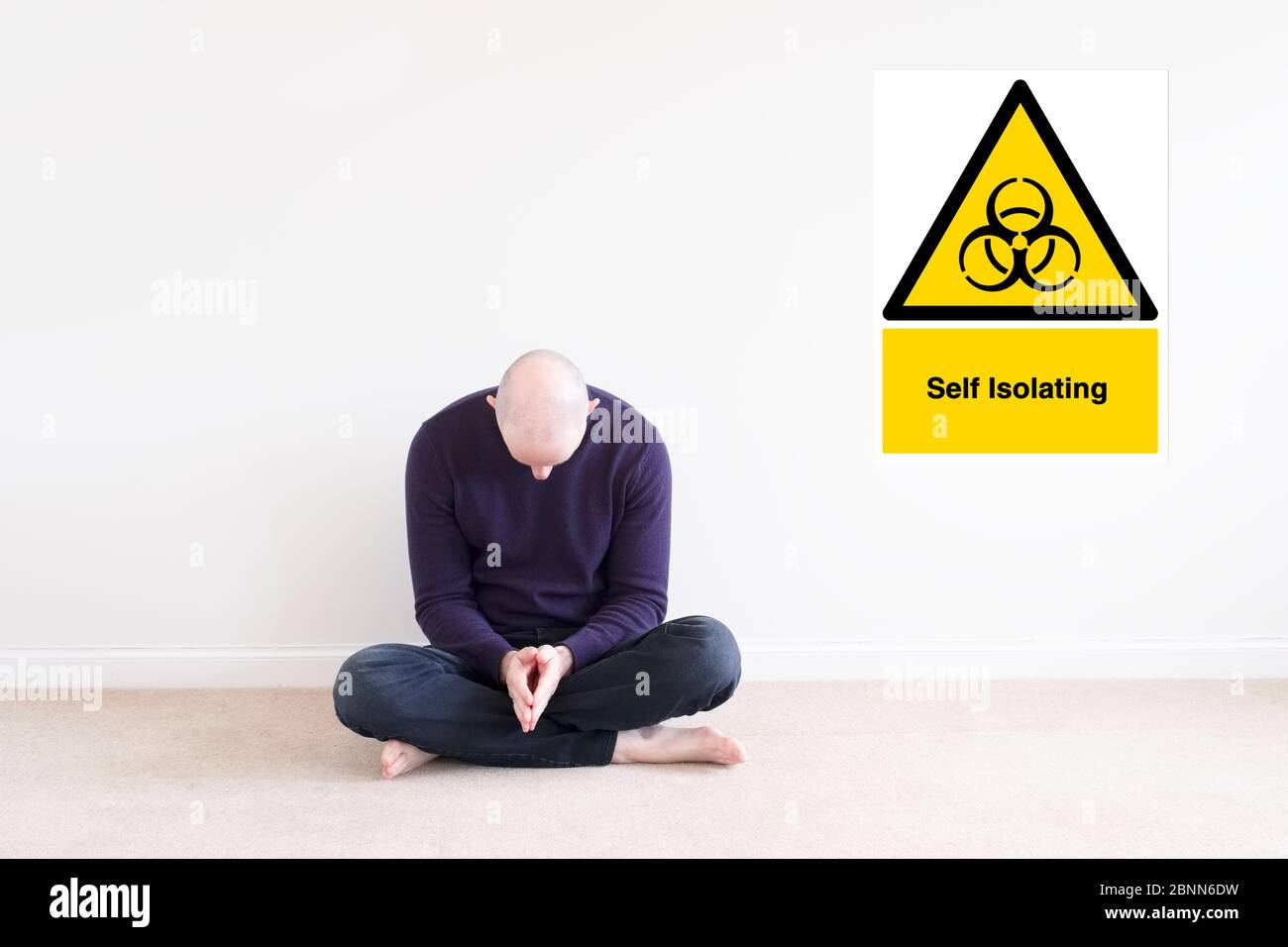 Self isolation man at home due to covid-19 Stock Photo - Alamy